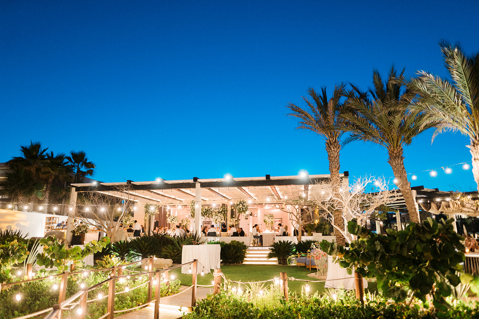 An Elegant Cabo Wedding with White Florals - Inspired By This